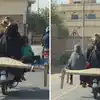 Pakistan Viral Video,'कार नहीं है तो क्या हुआ...' बाइक पर बांधी चारपाई ...