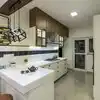 Which direction should we face while cooking?