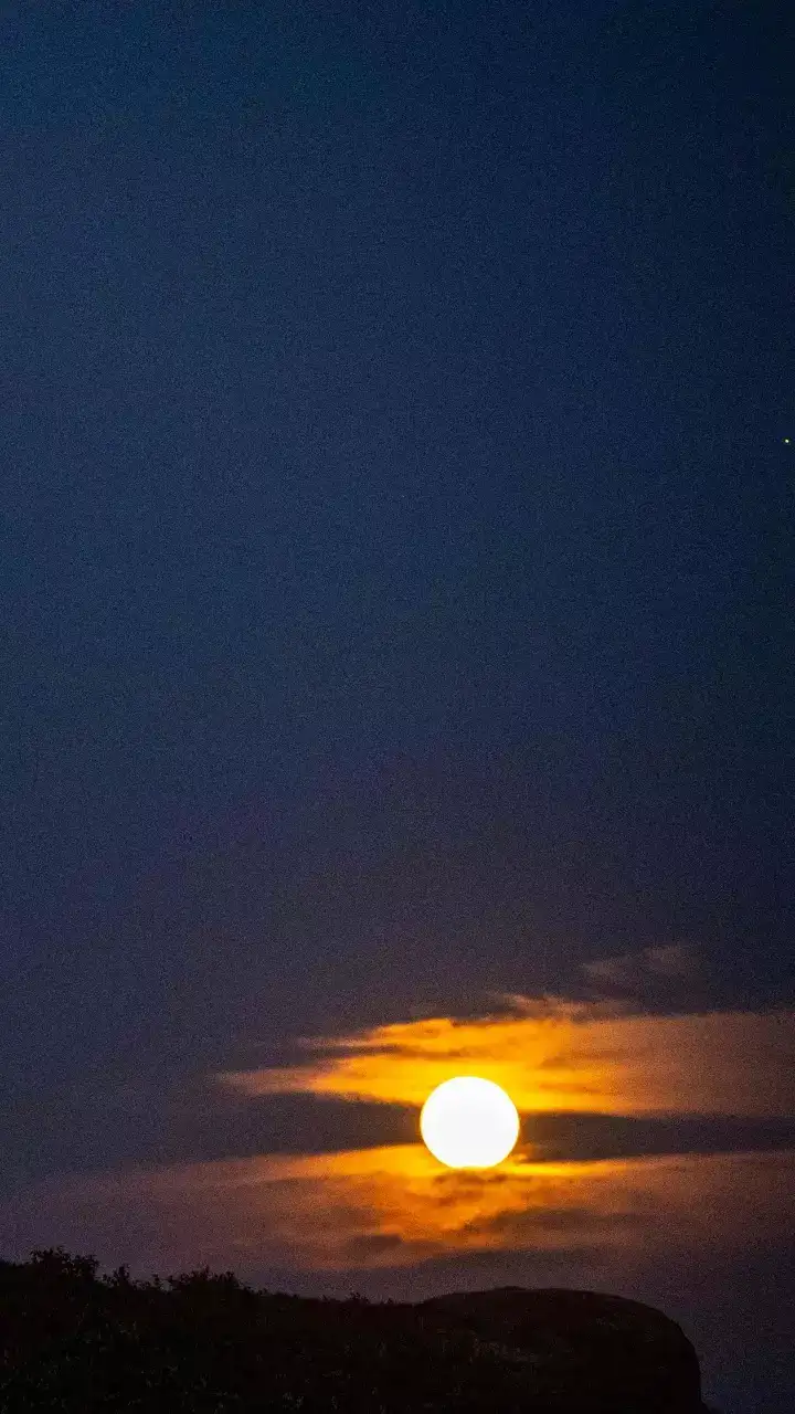 Sun And Moon Together In The Sky