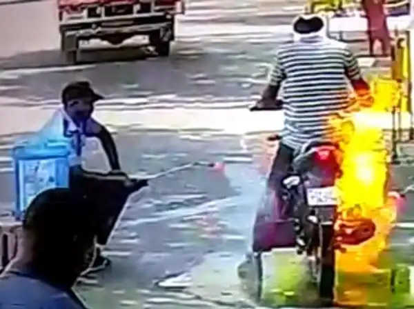 Bike Catch Fire During Sanitization In Ahmedabad Watch Viral Video