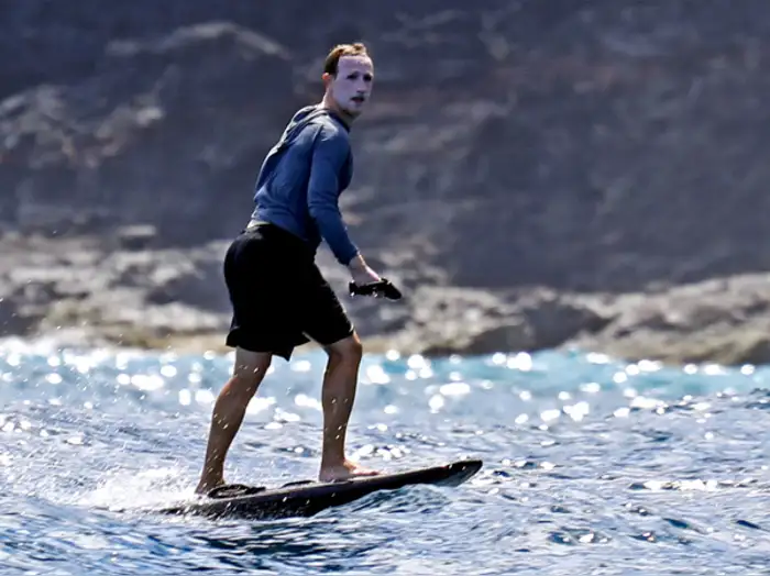 facebook ceo mark zuckerberg surfing in hawaii with too much sunscreen ...